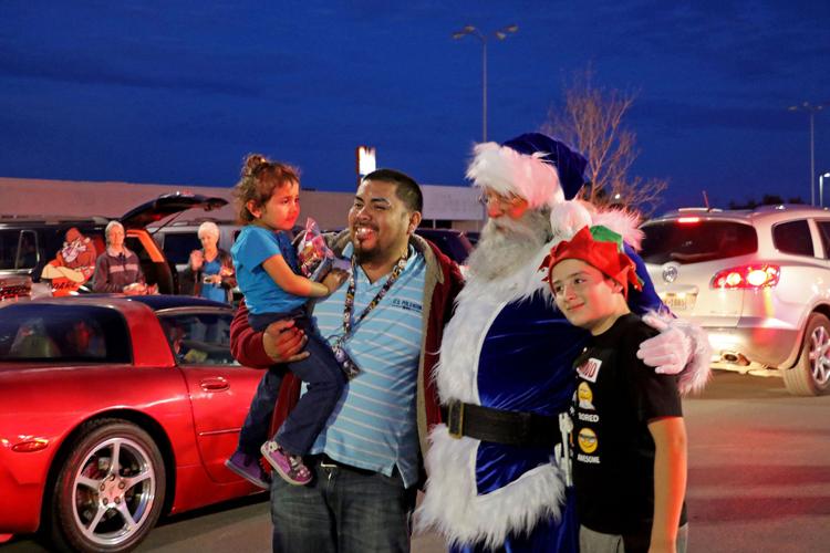 Blue Santa, Seguin PD officers pleased with turnout at H-E-B | News ...