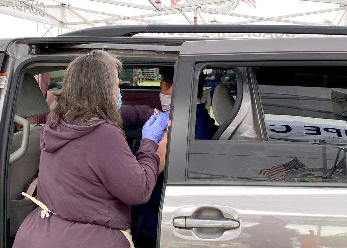 Officials: Drive-thru clinic success, 600 get shot on the go | News ...