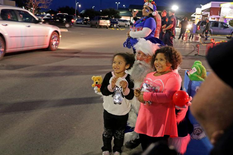 Blue Santa, Seguin PD officers pleased with turnout at H-E-B | News ...