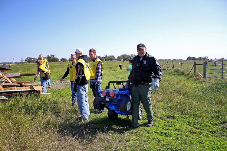 Volunteers take to fields to clear tornado debris in Geronimo | News ...