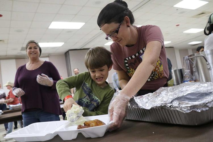 A day of giving: Volunteers serve up blessings at Community ...