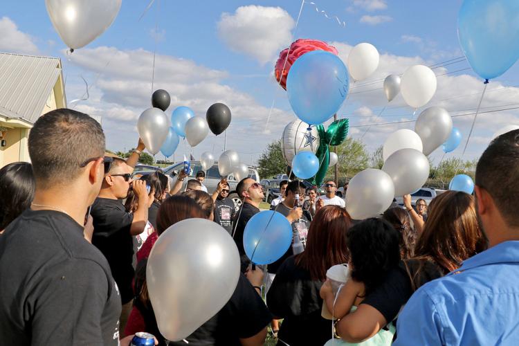 Slain mother, son remembered with balloon release | News ...