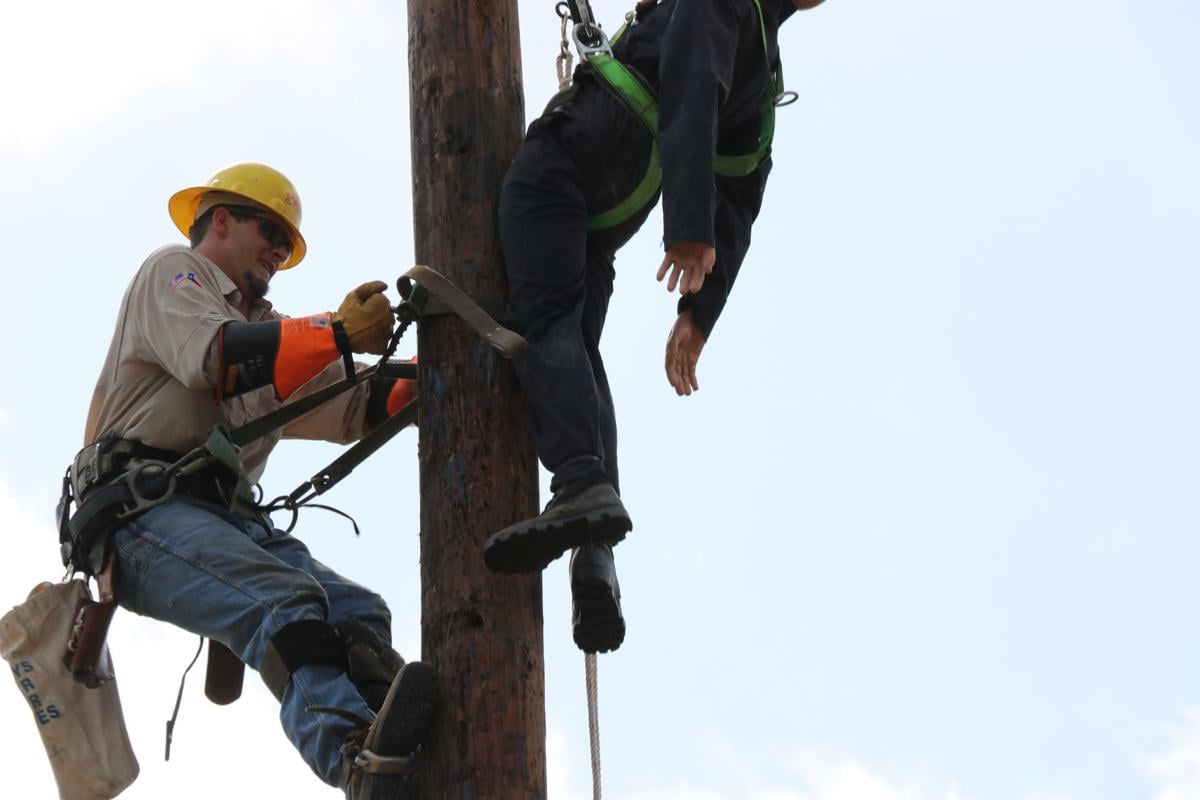 Making power moves: Electric linemen square off in competition, bask in ...
