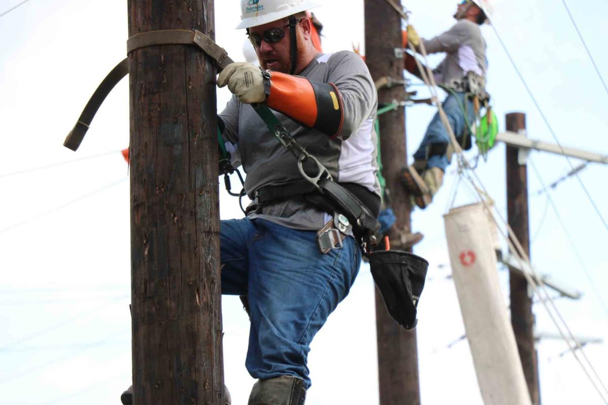 Making power moves: Electric linemen square off in competition, bask in ...