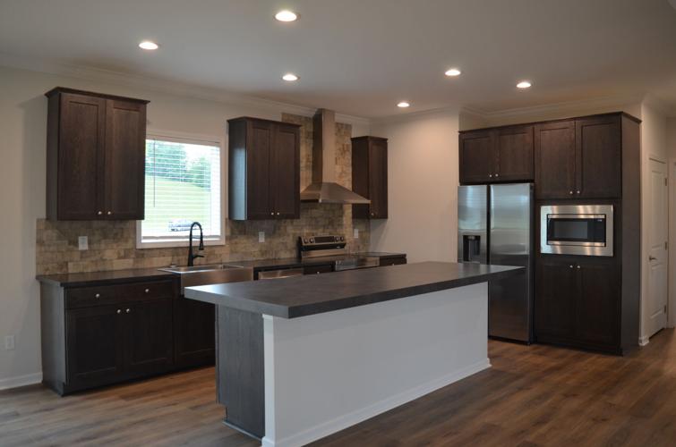Ribbon cut on Redbud Estates | News | sentinel-echo.com
