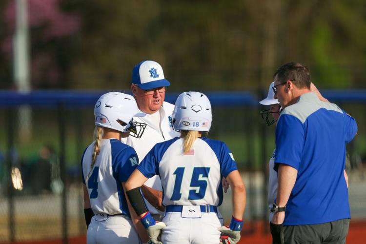 Emma Carl goes yard and picks up the win in the pitcher’s circle during ...