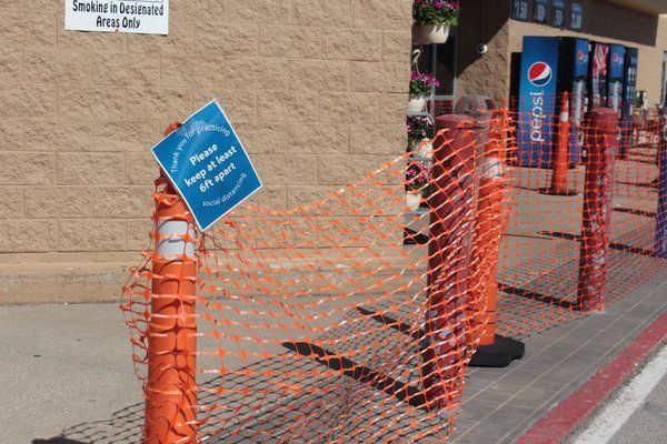 Keeping a distance: Stores implementing procedures to help customers ...