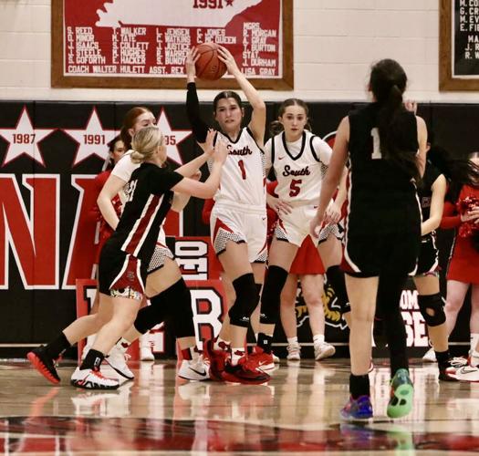 Three in double figures fuel Lady Cardinals’ rout of Harlan County ...