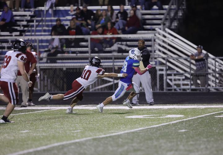 Cooper Robinson scores three TDs as North Laurel clinches playoff berth ...