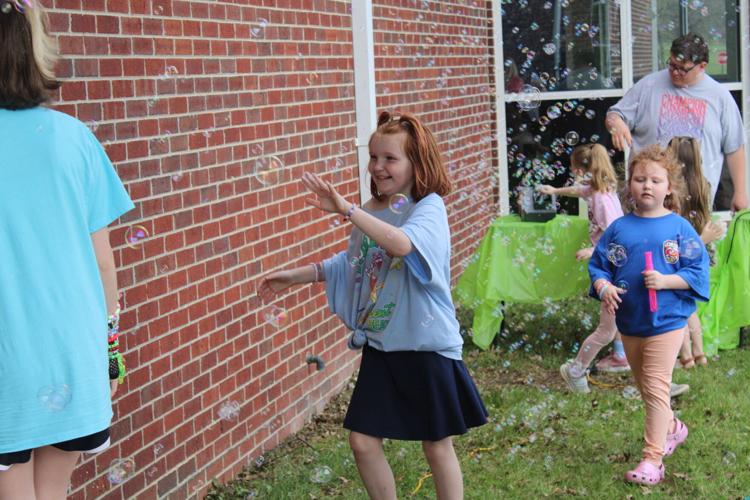 Bubbles fill the air at library’s annual autism celebration | Community ...