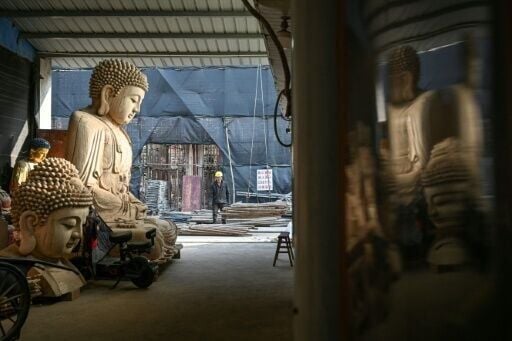 China's Buddha artisans carve out a living from dying trade | National ...