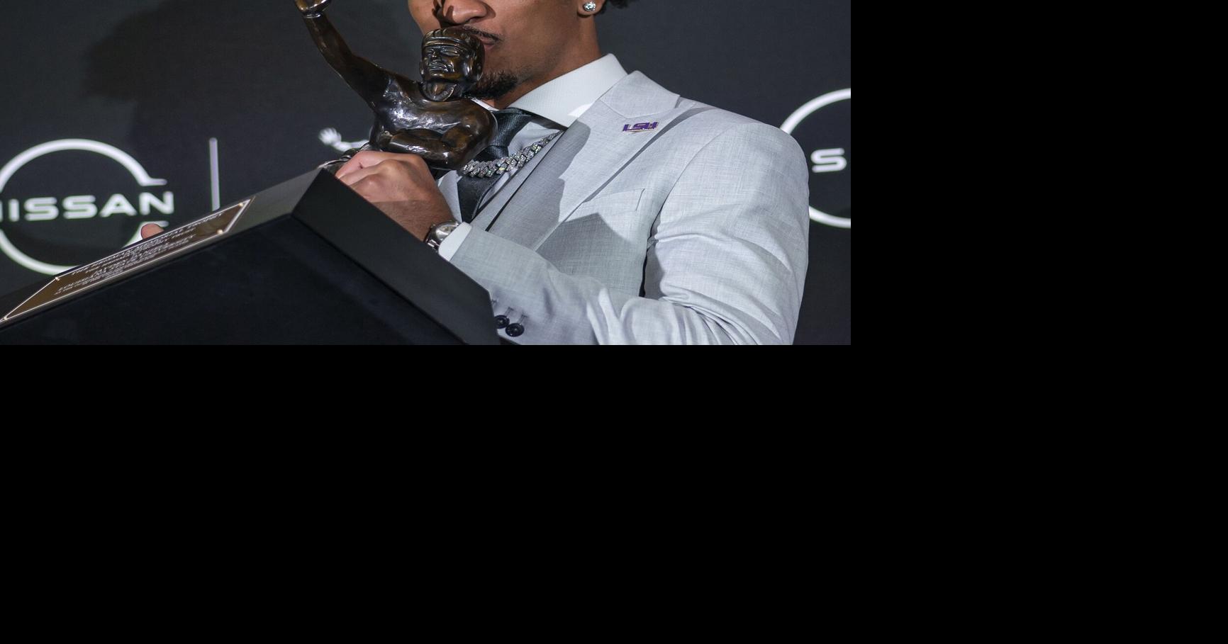 LSU QB Daniels overcomes being out of playoff hunt to win Heisman ...