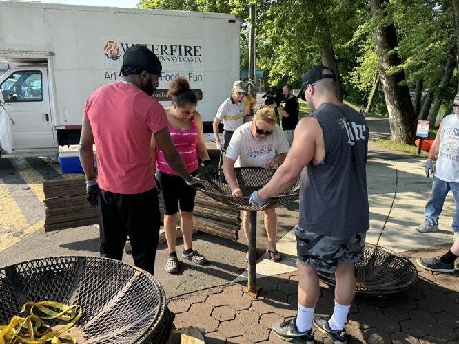 Braziers set up as WaterFire draws near | News | sharonherald.com