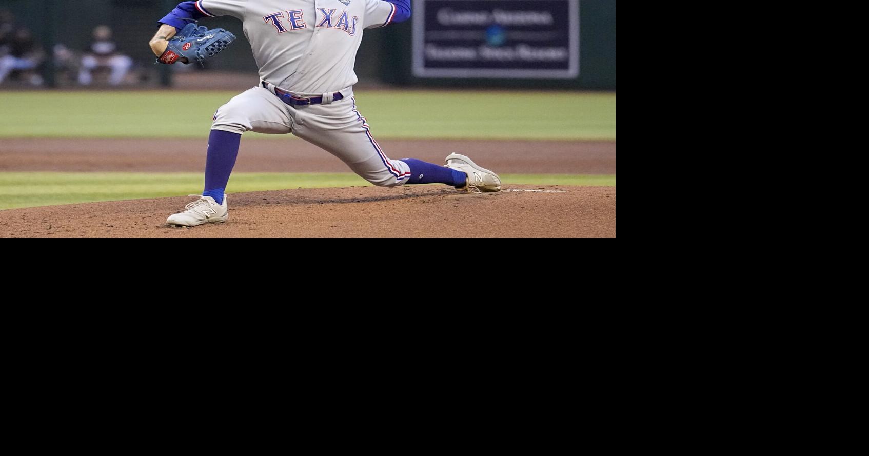 Heaney opts in for $13M to stay with Rangers, and World Series champs ...