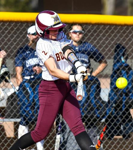 Victoria Rinaldi #21 makes contact with the ball, the ball ends up over ...