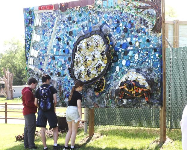 Students create mural bringing awareness to endangered turtle species ...