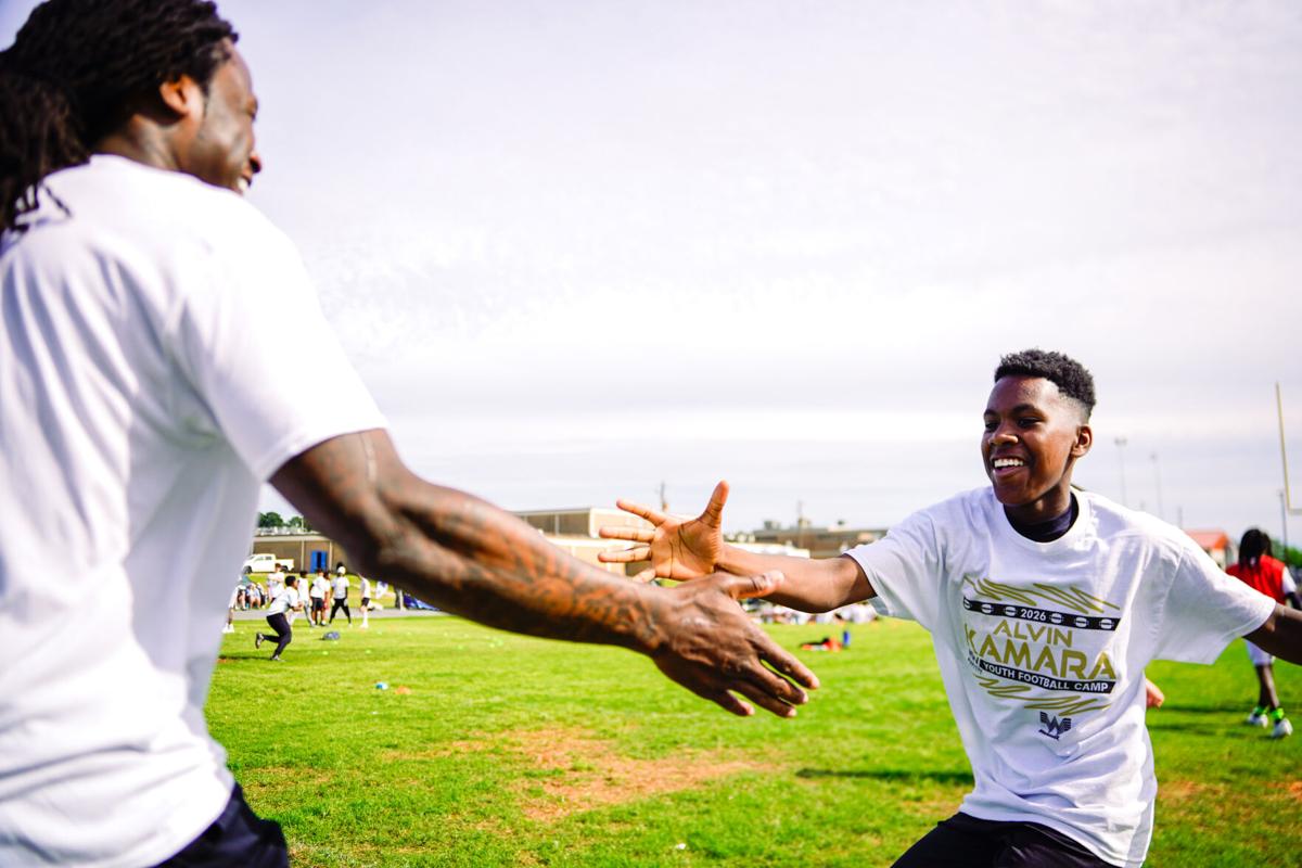 Photos: Hundreds attend Saints running back Alvin Kamara's football ...