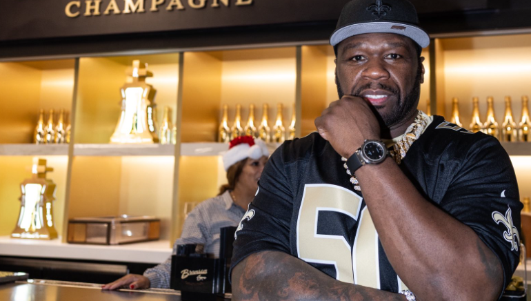 50 Cent attends Saints home game, poses with officials | Food ...