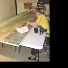 Expert works on Ralston painting | Local News Stories | sidneyherald.com