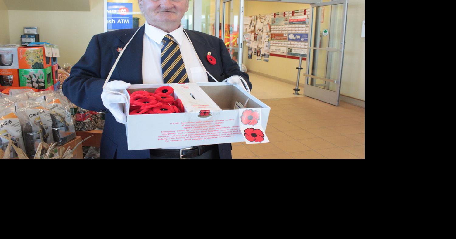 Alliston Legion members handing out poppies