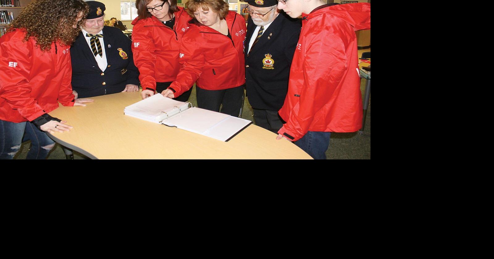 Stayner Collegiate Institute students carrying remembrance book to Vimy