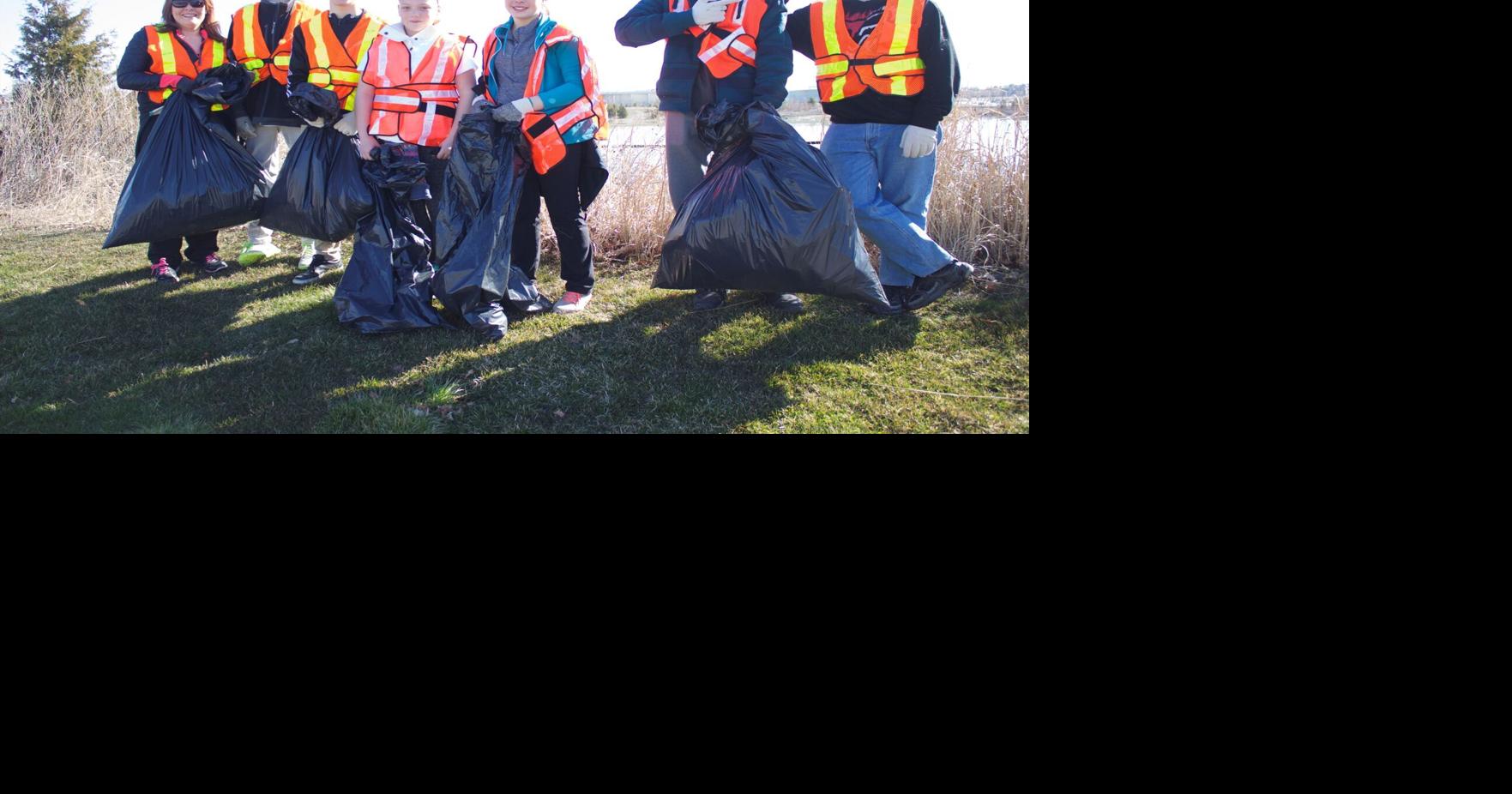 Volunteers eliminate litter during annual Community Clean-up Day in ...