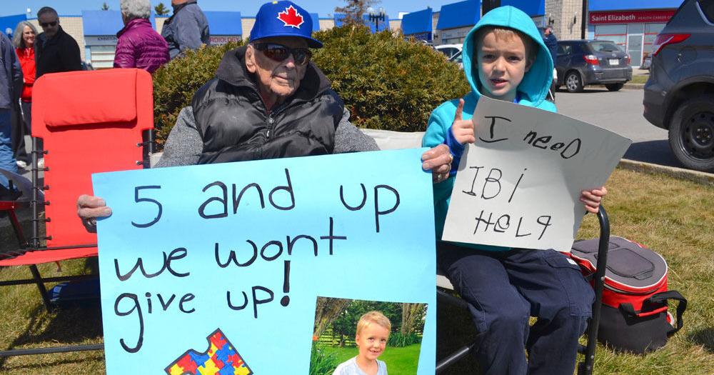 Barrie protest against autism cuts draws ire, tears from parents