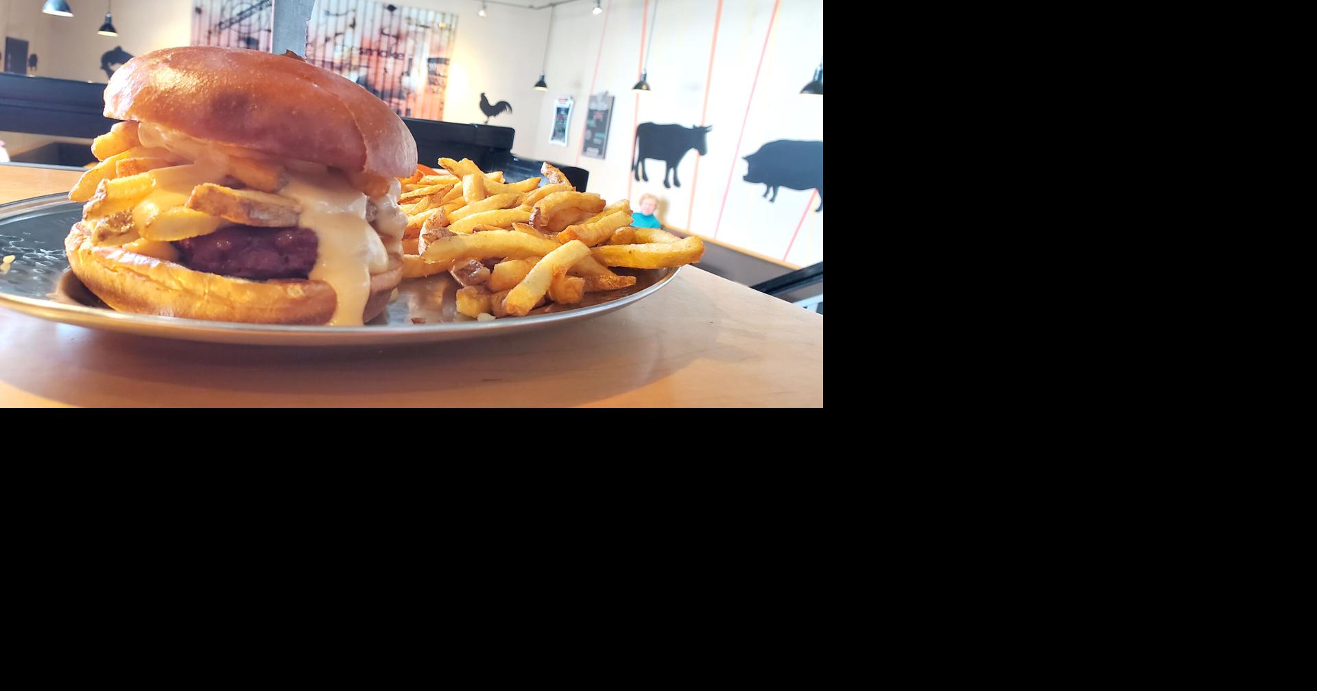 The Smoke’s poutine burger made for Collingwood cheese fans