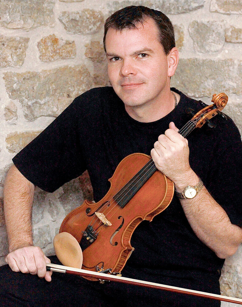 Woods brings fiddle legends to life