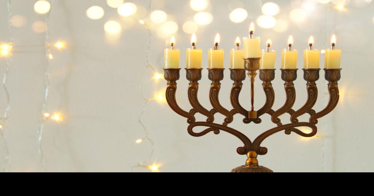 Chabad Jewish Centre iholding Hanukkah menorah lighting