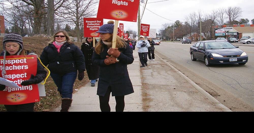 Elementary teachers protest outside local schools