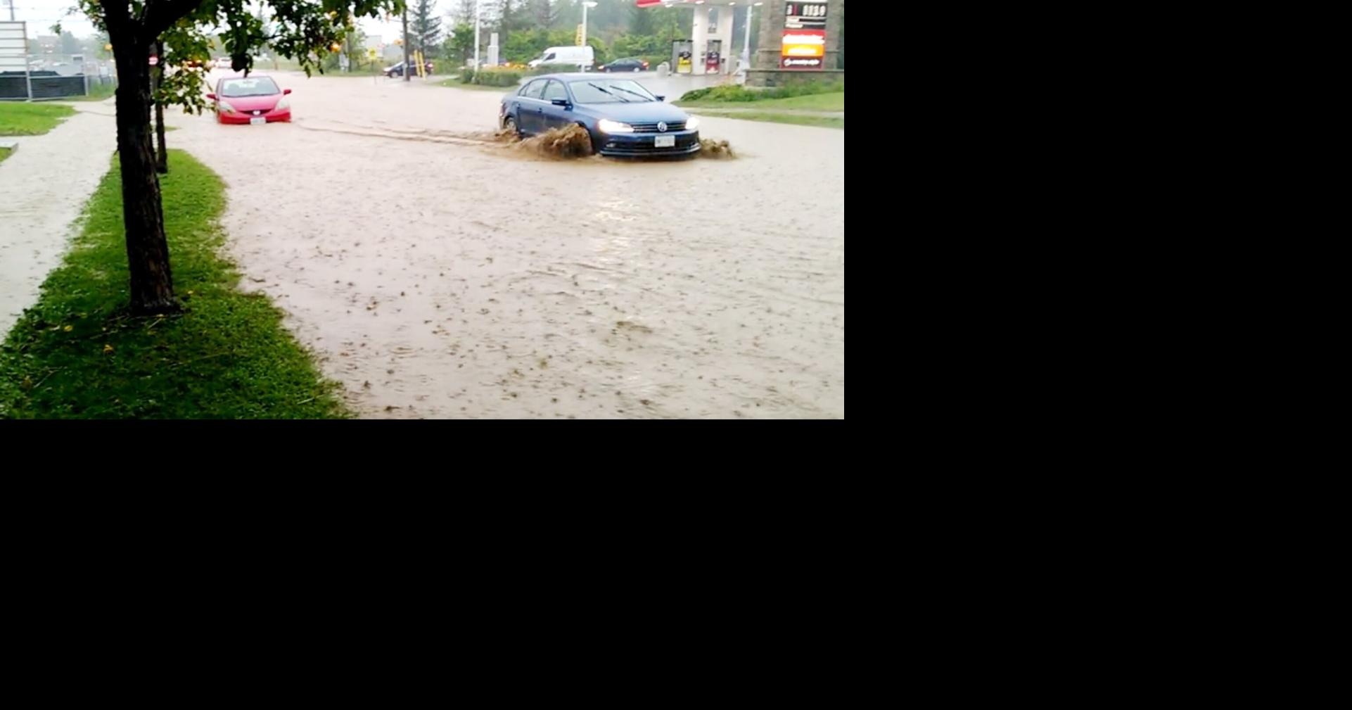 Videos capture muddy water flowing into streets of Beeton