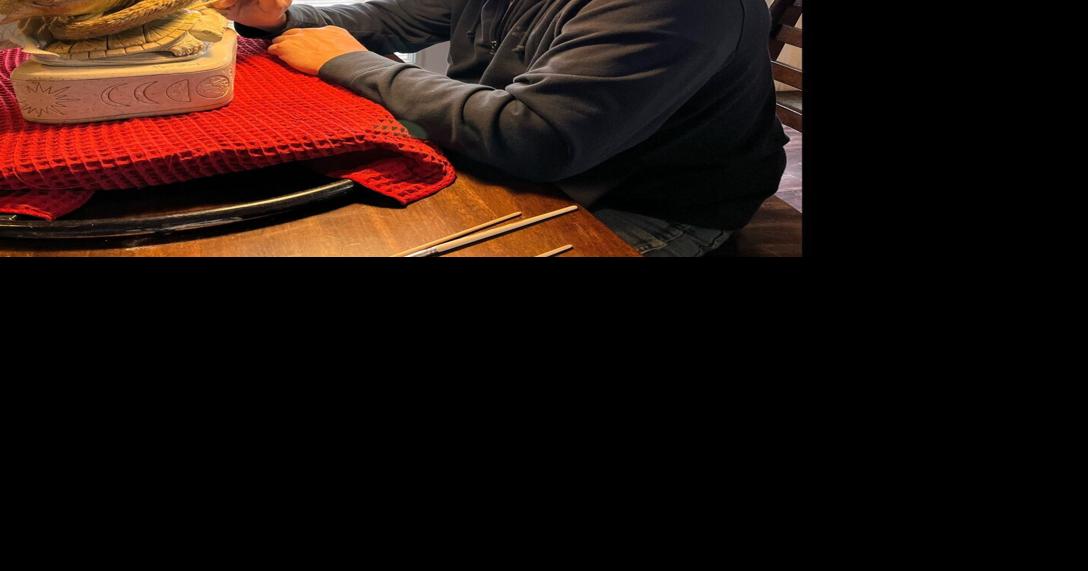 Artist can feel stories flow into soapstone sculptures