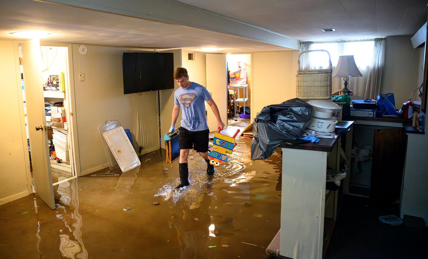 Street by street, flood cleanup begins in Spencer