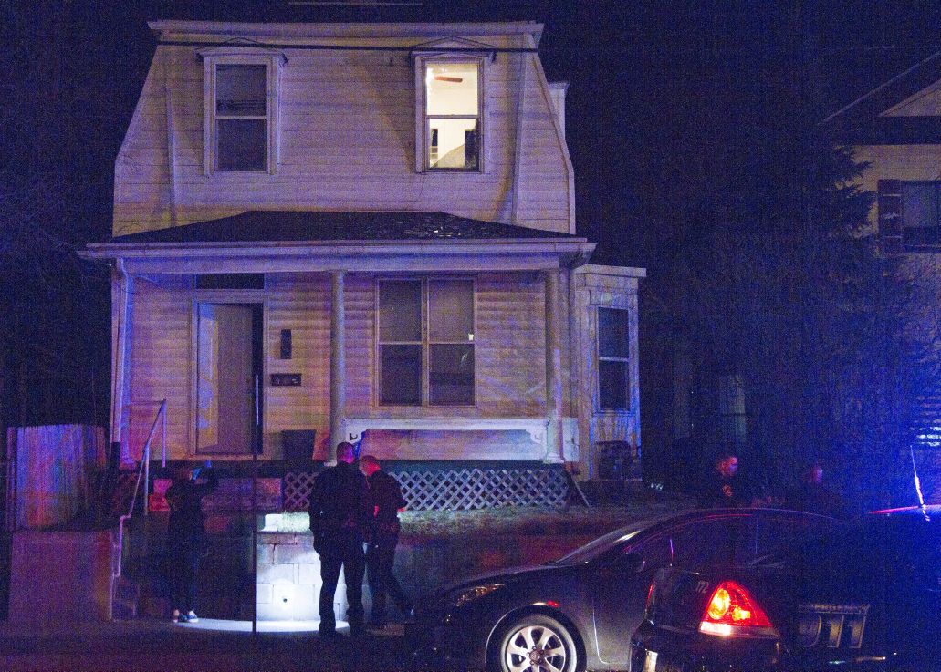 Man injured after breaking out window, falling off roof