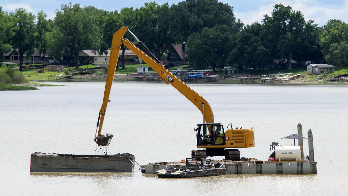 Car, furniture, other debris pulled from McCook Lake as state completes ...
