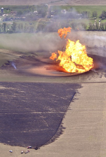 Men didn't call before excavating field, causing explosion, company says