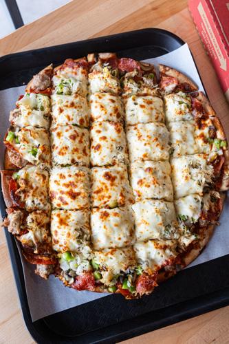 PROGRESS: Red's Savoy brings 'Sota style pizza to Siouxland