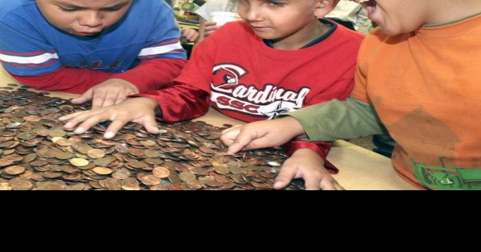 Covington kids push pennies for veterans park