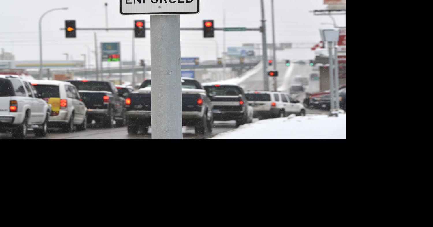 Iowa House votes to regulate, not ban traffic-enforcement cameras