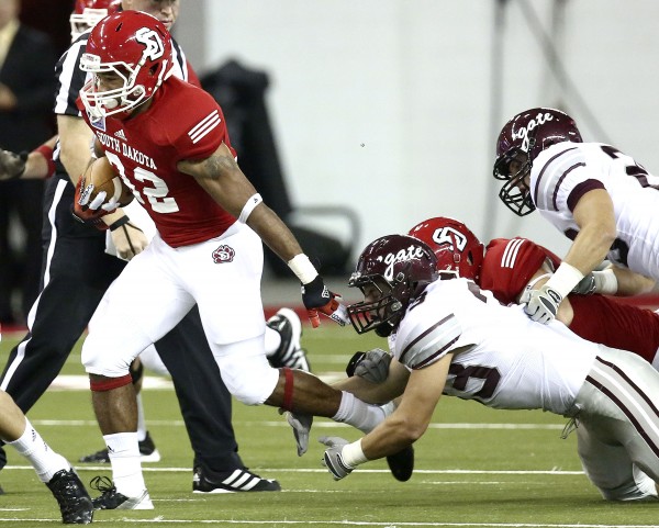 USD running back Sims impresses large following