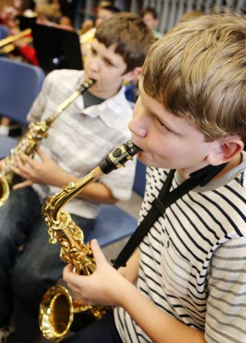 Banding together: Students choose musical instruments to suit their ...