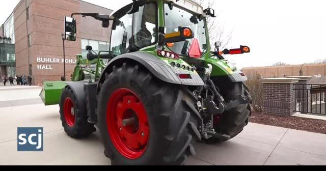 Morningside's John Reynders takes a final tractor ride across campus