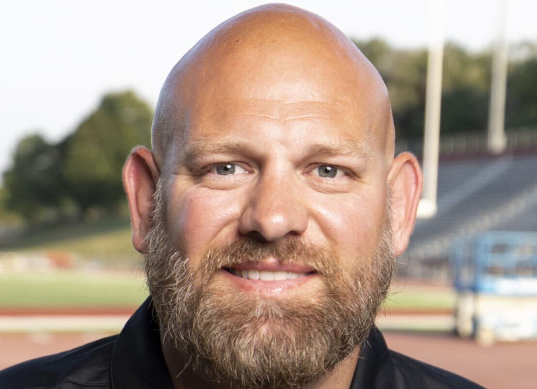 East football coach named an Iowa Wrestling Official of Year
