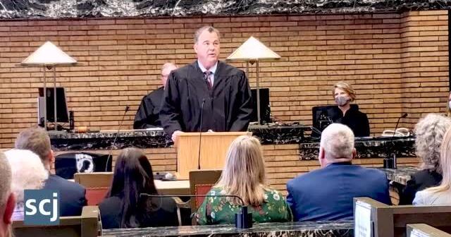 Judge James Daane makes remarks at his investiture ceremony