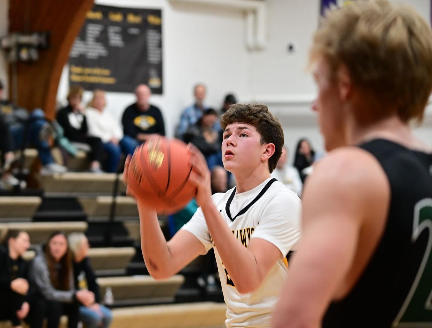 Boys basketball: Blackhawks hang on to ring in '24 with win