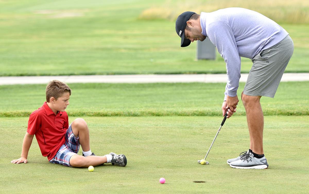 Photos: Michael Greller, Jordan Spieth's caddie, at Orange City golf camp