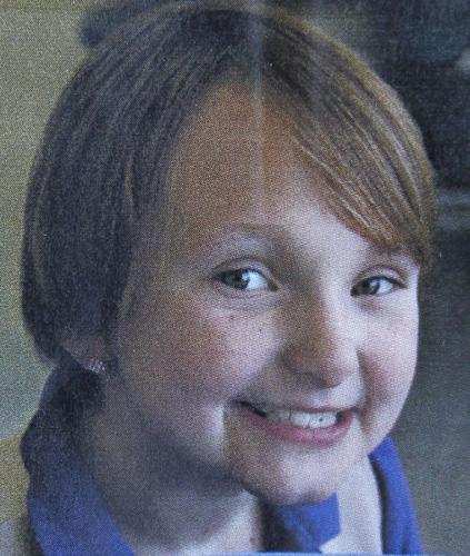 Hundreds mourn at burial ceremony for Elizabeth Collins