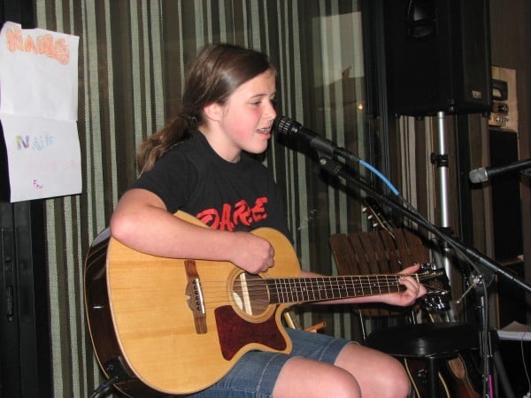 In the spotlight: Aspiring singers hit the stage during weekly open-mic ...