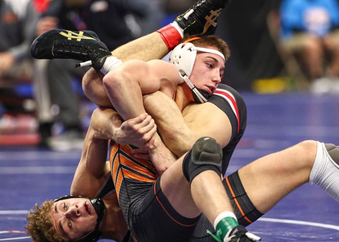 Prep wrestling: Five area grapplers slide into title bouts
